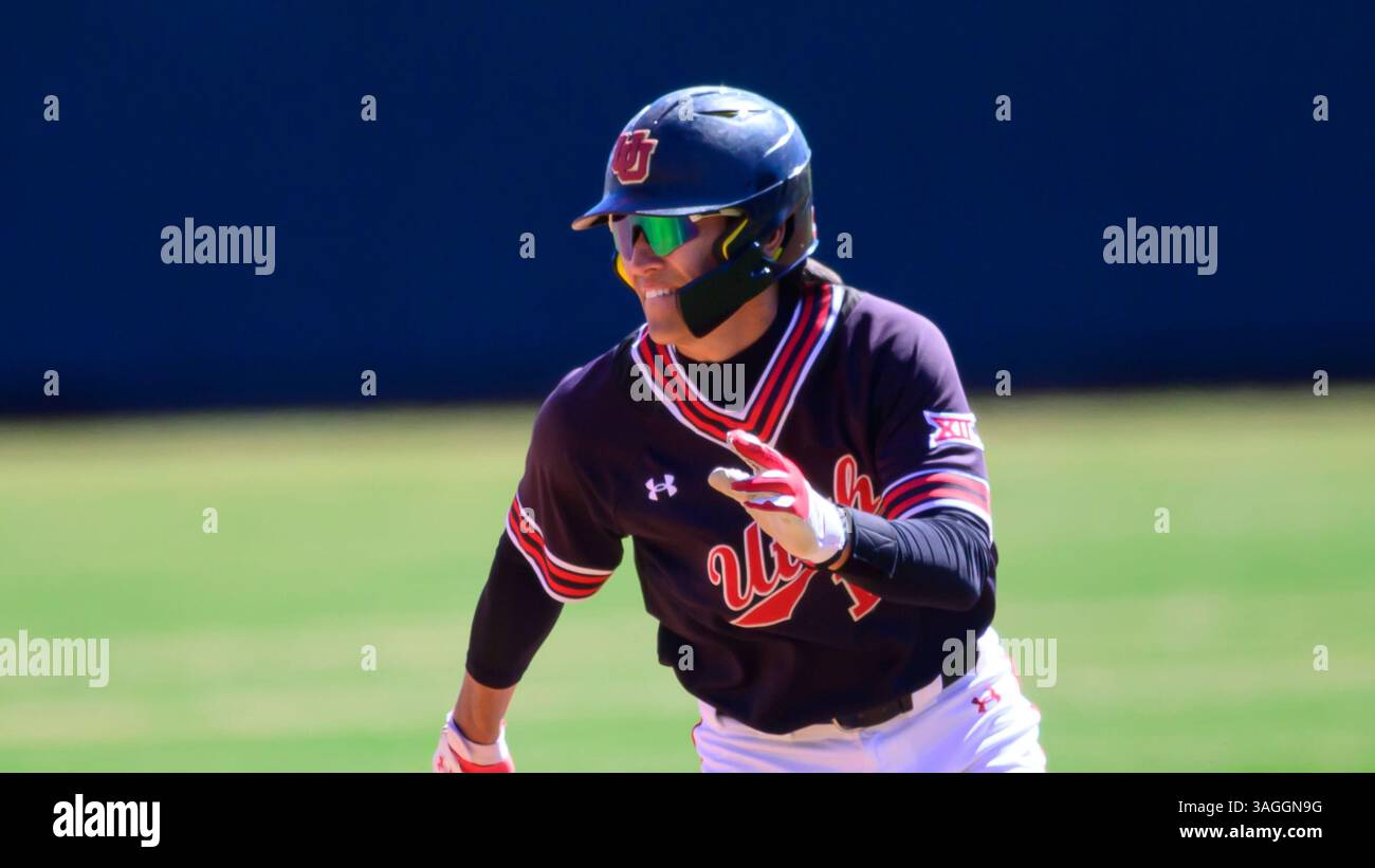 Utah infielder Tyler Quinn runs to third base during an NCAA baseball ...