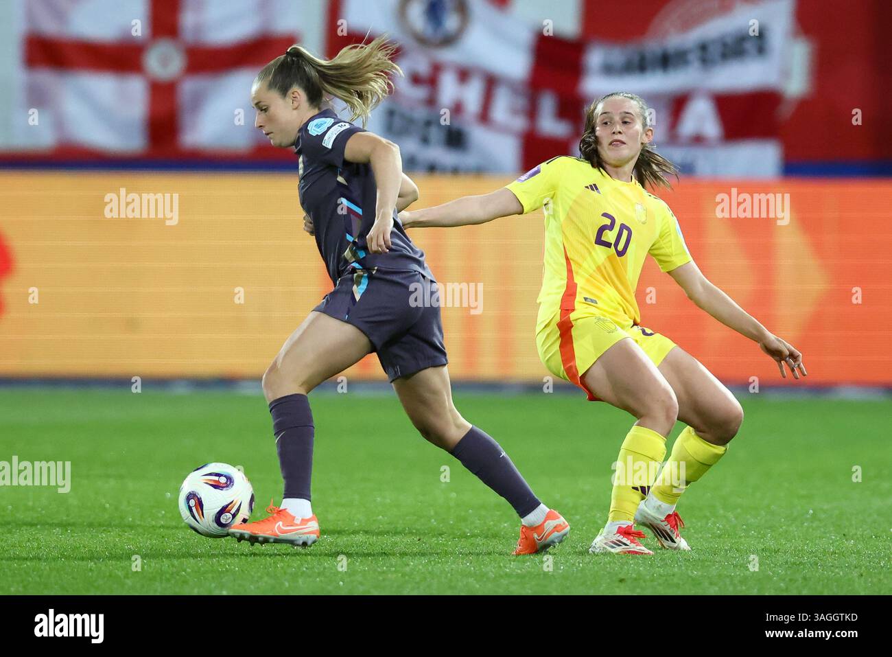 England's Ella Toone and Belgium's Marie Detroyer fight for the ball ...