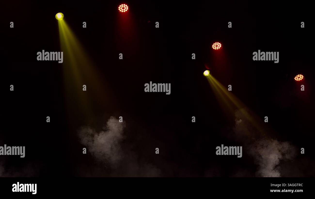 Stage lights background. Light beams and smoke from the stage ...