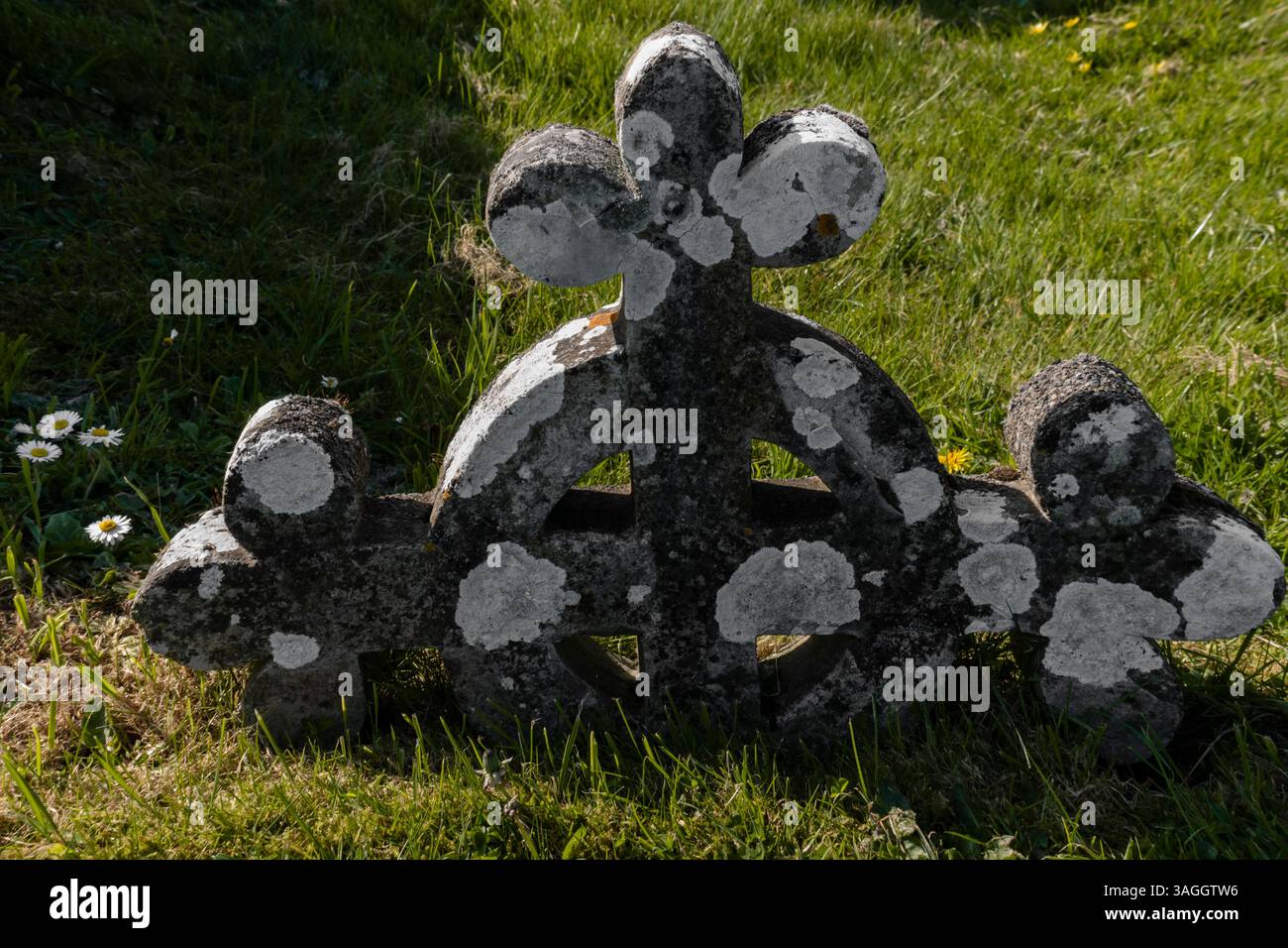 Celtic cross stuck in the ground Stock Photo - Alamy