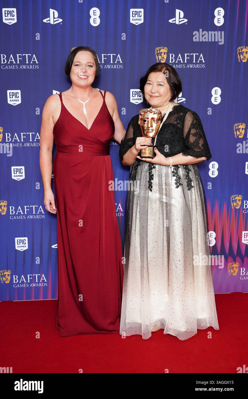 Yoko Shimomura with the Fellowship Award, with award presenter Jessica ...
