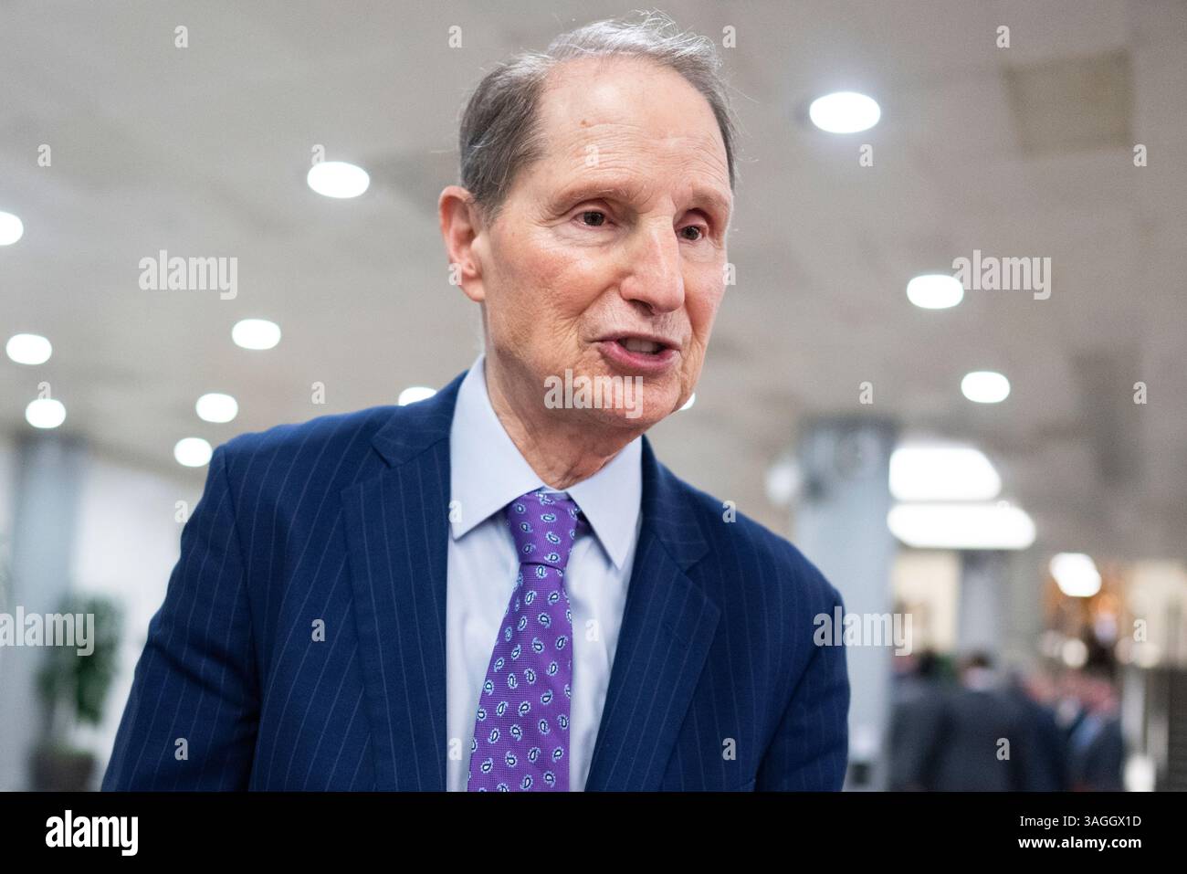 UNITED STATES - APRIL 8: Sen. Ron Wyden, D-Ore., talks with a reporter ...