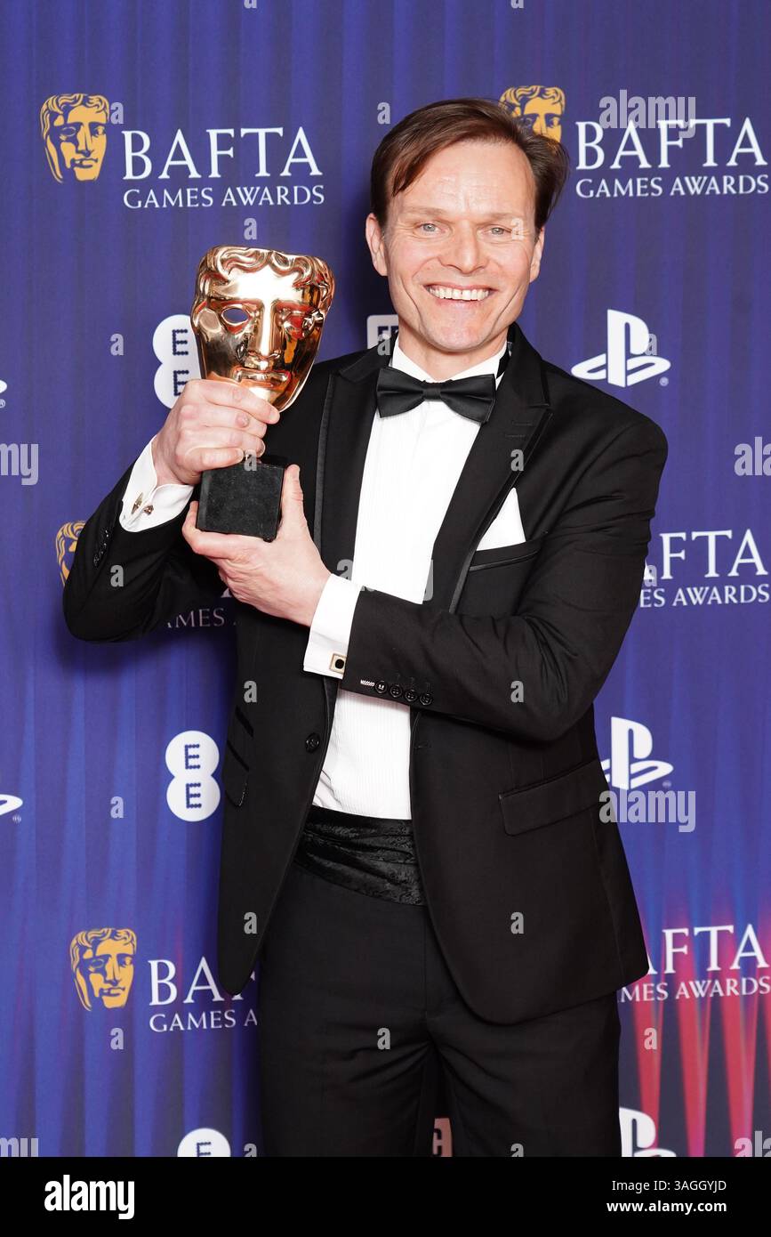 Alec Newman with the award performer in a leading role for the game ...