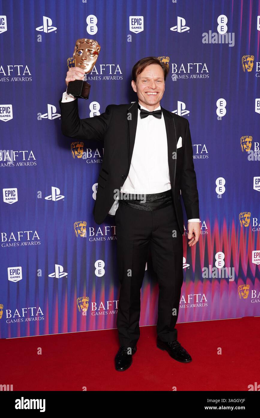 Alec Newman with the award performer in a leading role for the game ...