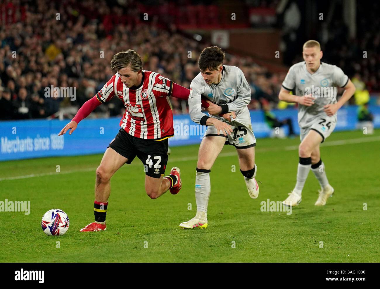 Sheffield United's Sydie Peck (left) and Millwall's Luke Cundle (centre ...