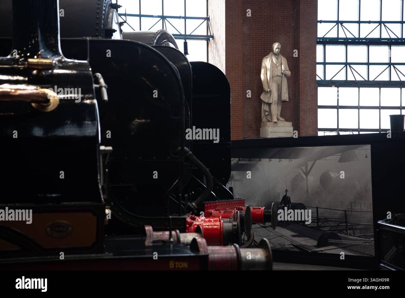 The statue of George Stephenson in The Great Hall looking down on to ...