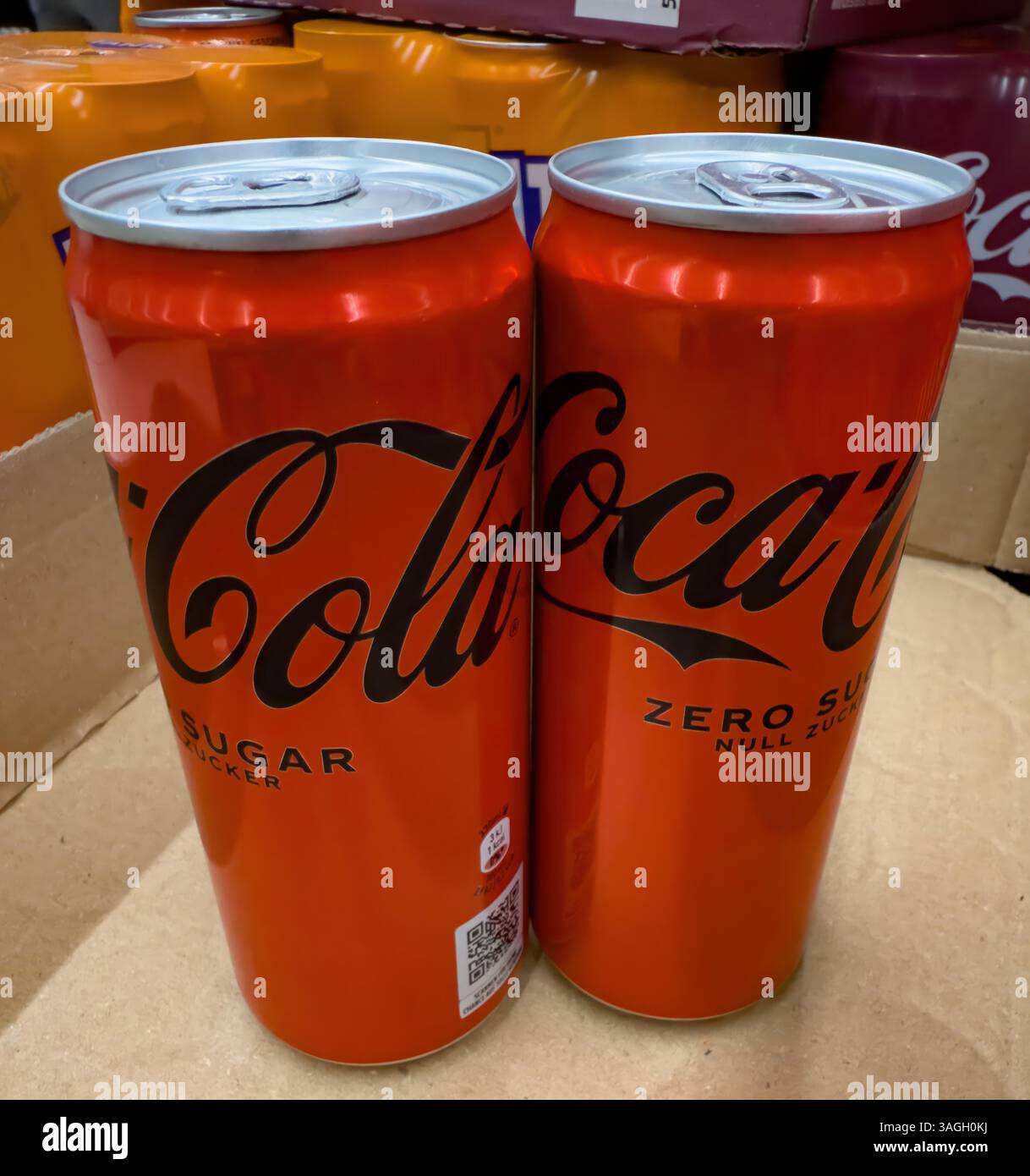 A close-up view of Coca-Cola Zero Sugar cans, showcasing their bold red ...