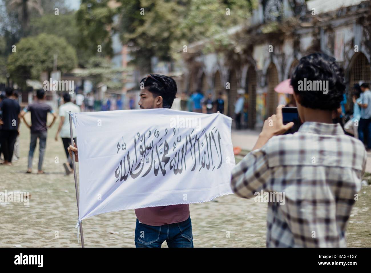 7 April 2025: Feni, Chittagong, Bangladesh: A boy was flying a flag ...