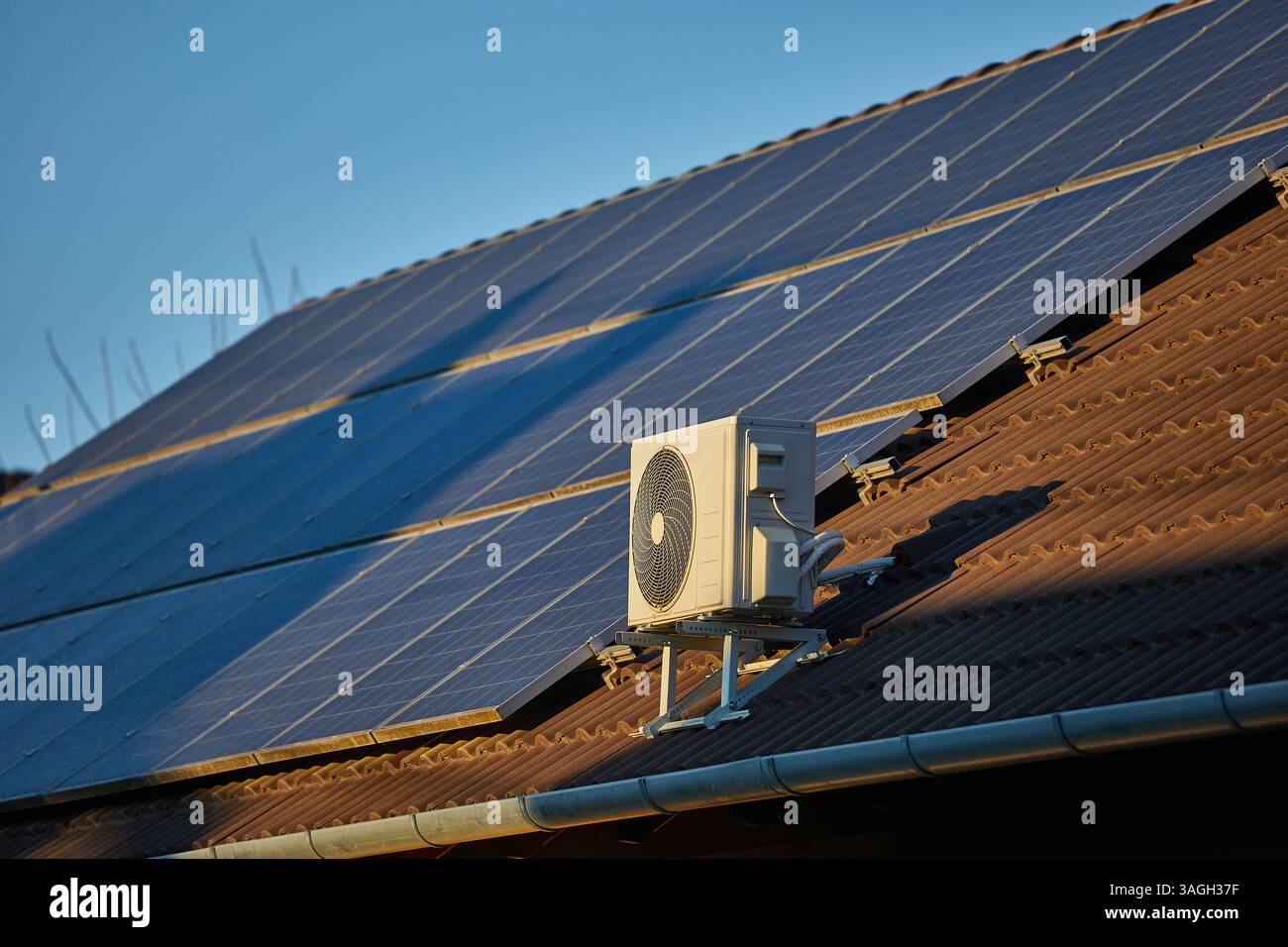 Air-conditioner exterior unit on solar roof Stock Photo - Alamy