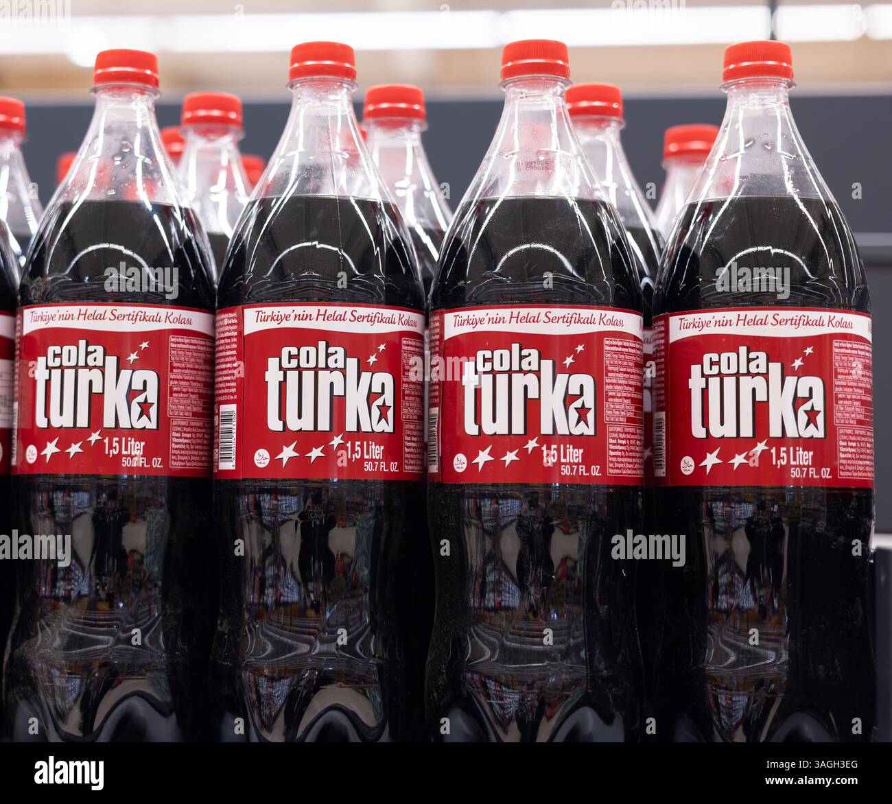 A shelf of Cola Turka bottles showcasing the distinct branding and ...
