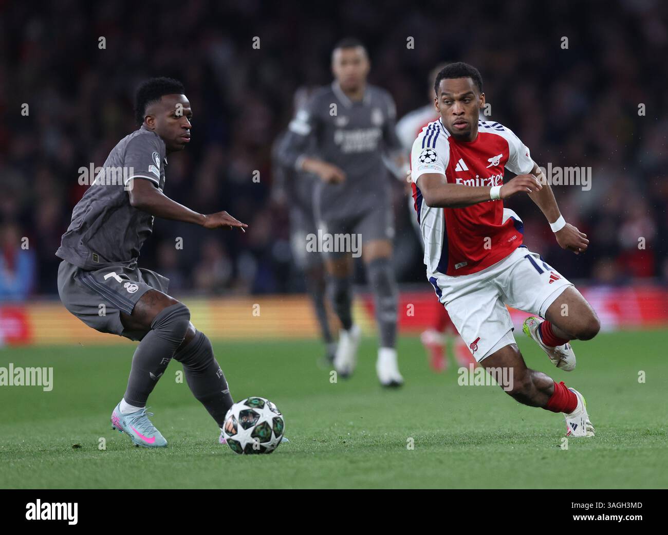 London, UK. 8th Apr, 2025. Vinicius Junior of Real Madrid and Jurrien ...