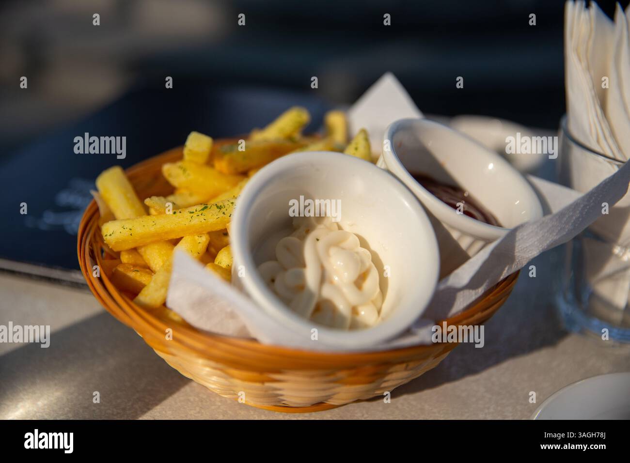Basket of Fries to share as a snack Stock Photo - Alamy