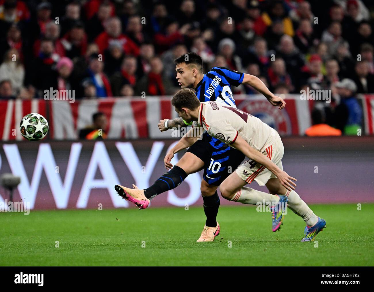 Bayern's Josip Stanisic, front, fights for the ball with Inter's ...