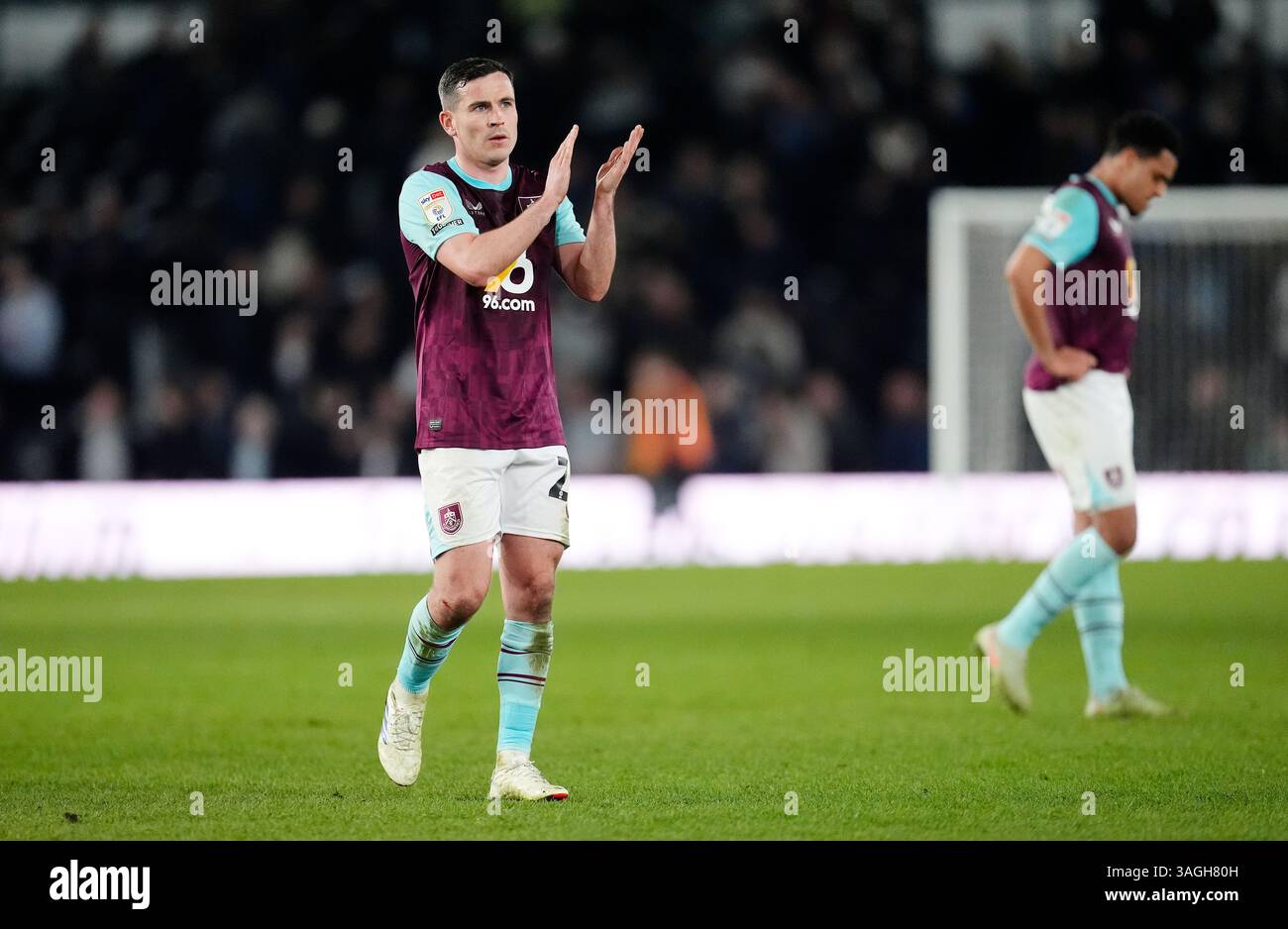 Burnley's Josh Cullen (left) and CJ Egan-Riley after the Sky Bet ...