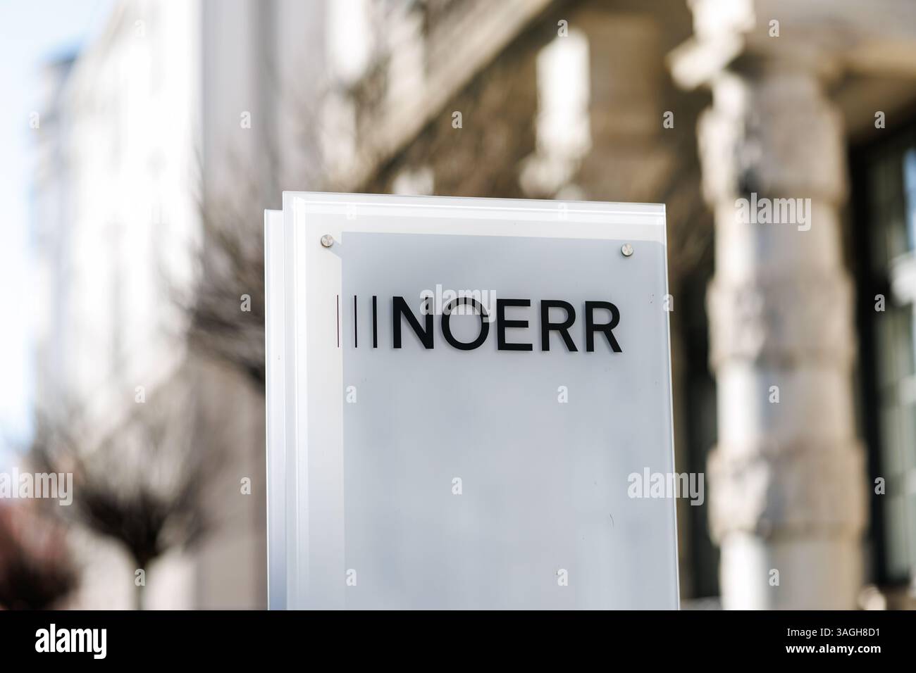 06 April 2025, Bavaria, Munich: Company sign with logo and lettering of ...