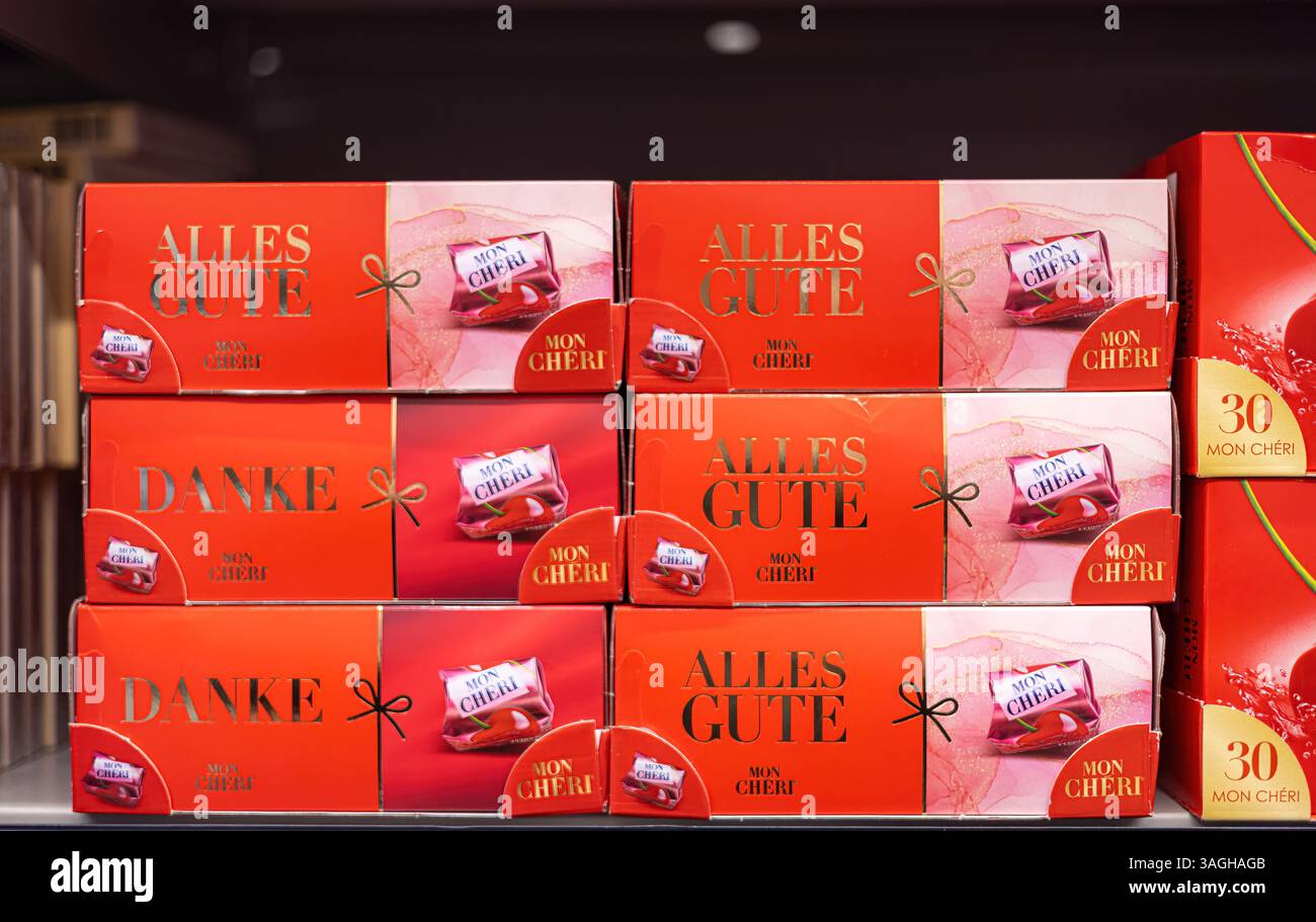 An eye-catching box of Mon Cheri chocolates in vibrant colors ...