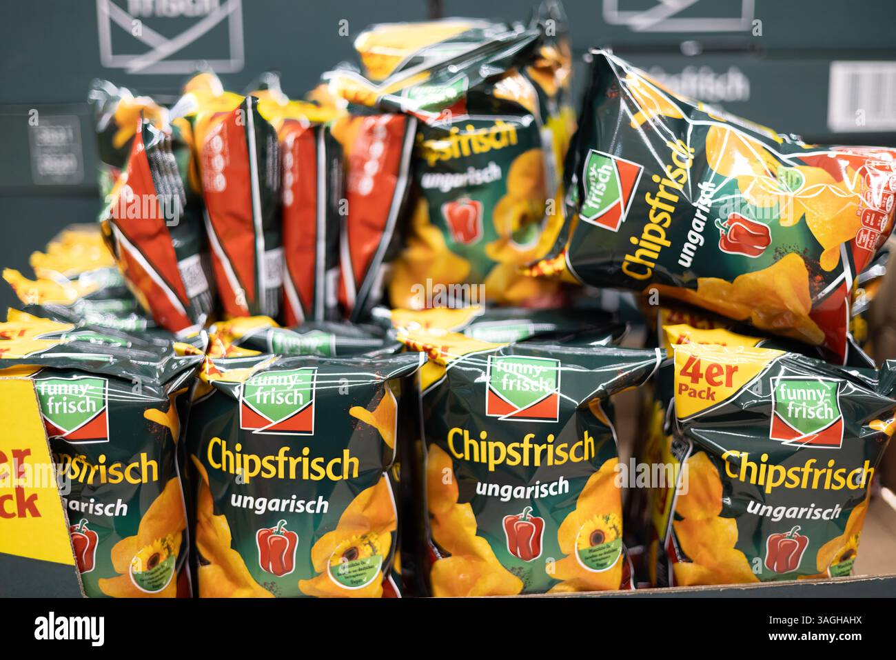 A vibrant display of chips bags, showcasing different flavors and ...