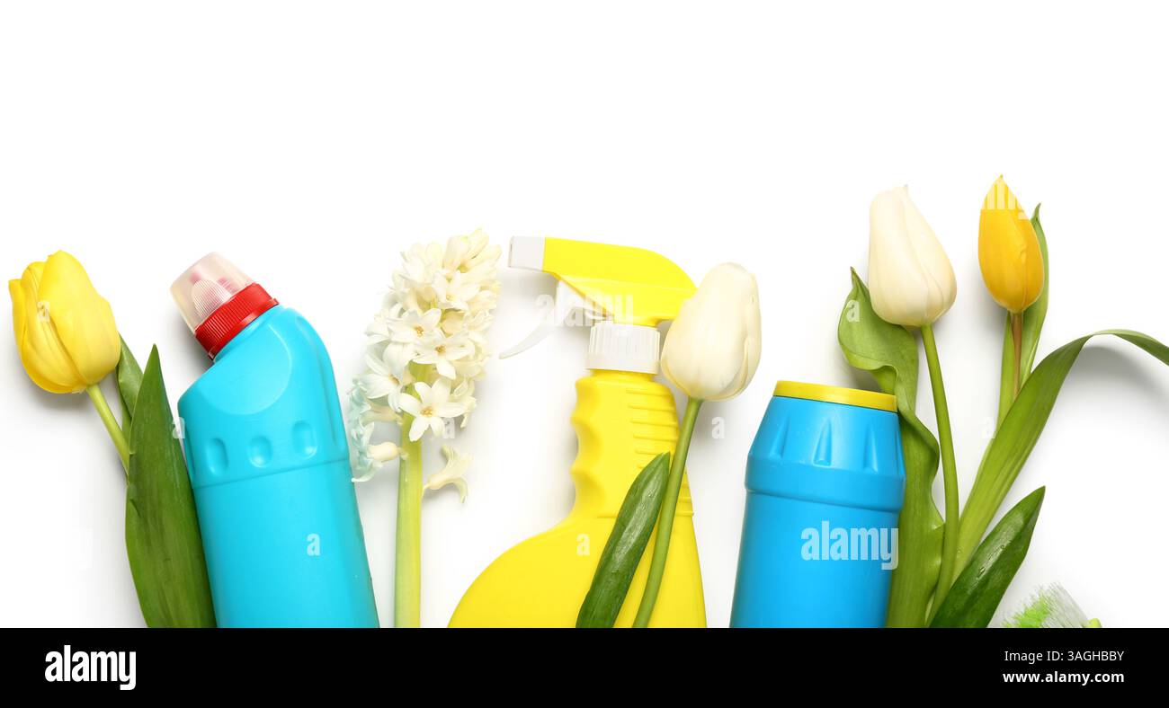 Bottles of detergents with spring flowers on white background Stock ...
