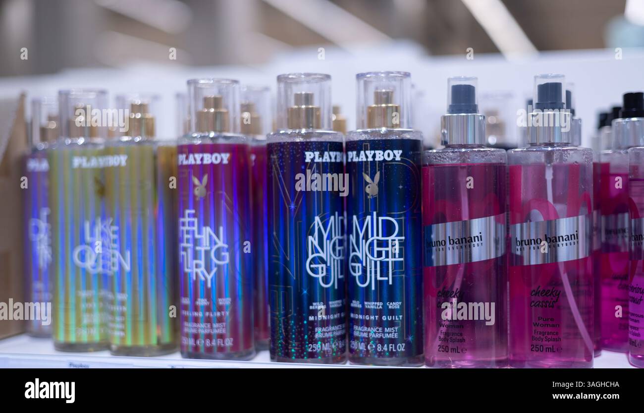 A collection of Playboy fragrances, each with distinct designs that ...