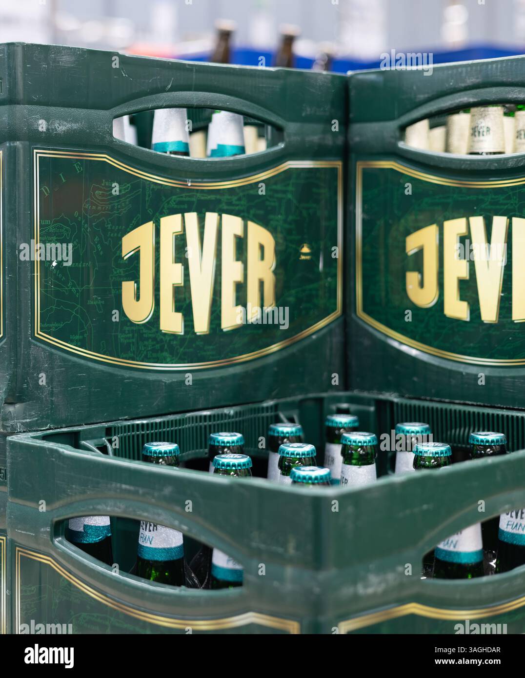 A close-up of green crates filled with Jever beer bottles showcasing ...