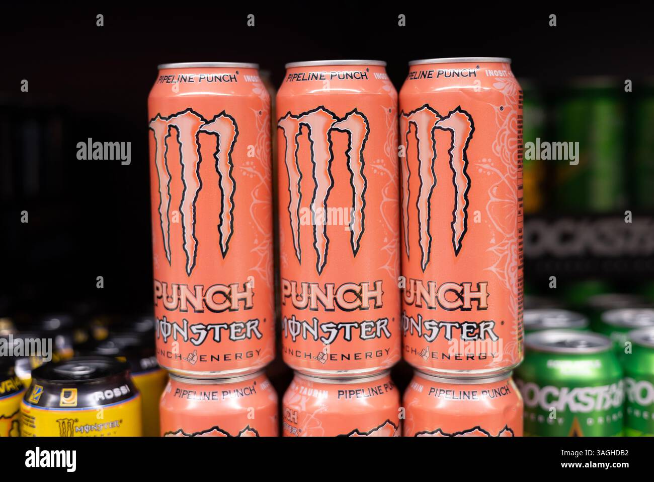 A striking image of Pipeline Punch Monster energy drink cans arranged ...