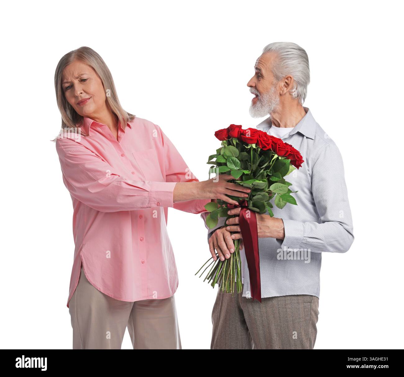 Dissatisfied woman refusing from man's bouquet of red roses on white ...
