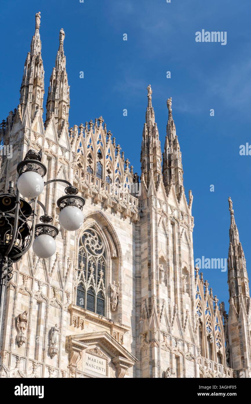 Milan, Italy - April 3, 2025: The facade of the Milan Cathedral (Duomo ...