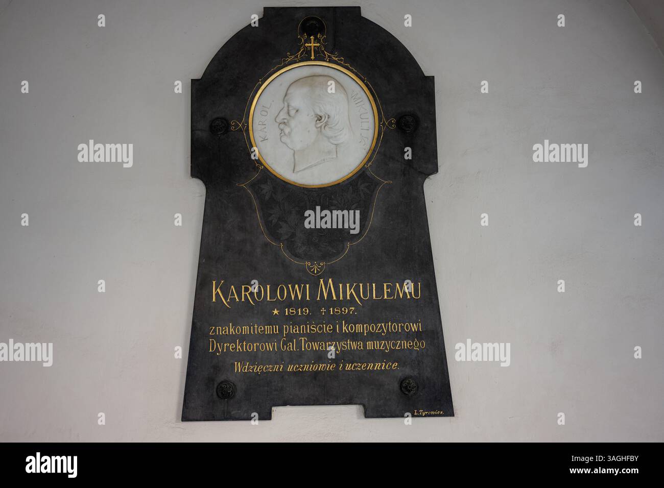 Lviv, Ukraine - April 07, 2025: Engraved memorial plaque with Karol ...