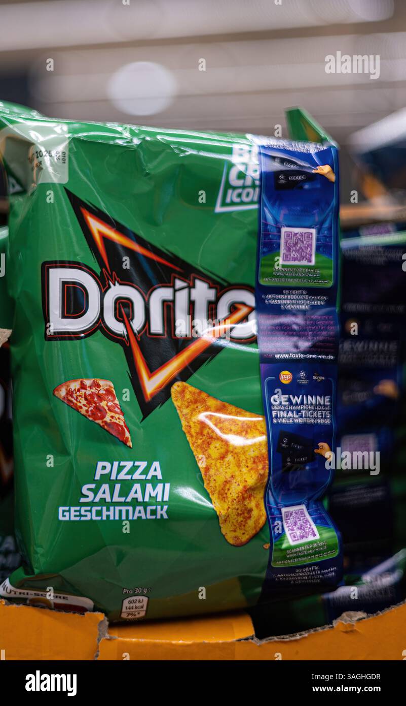 This image features Doritos nacho cheese snack bags prominently ...