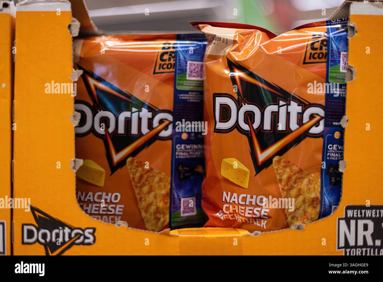 This image features Doritos nacho cheese snack bags prominently ...