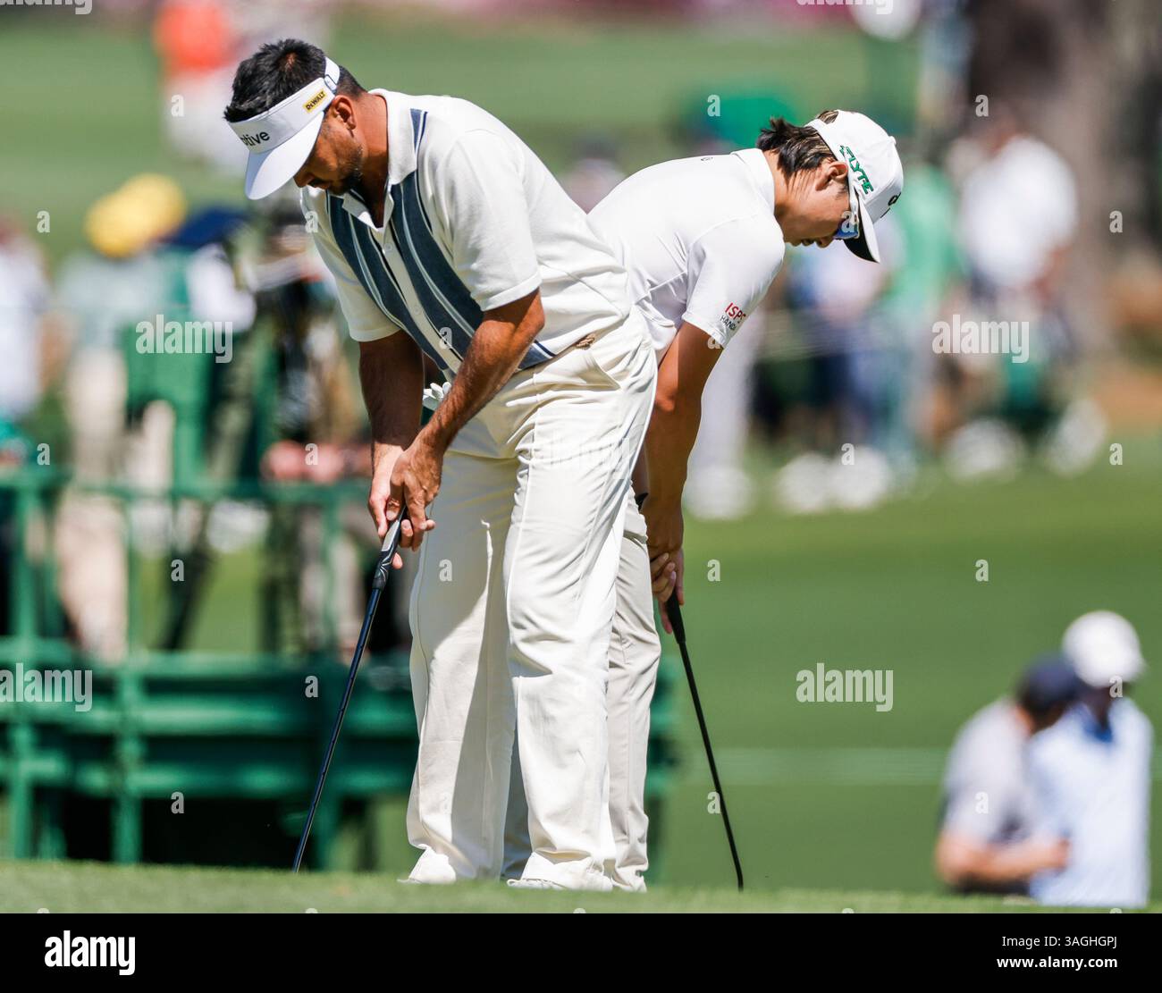 Augusta, United States. 08th Apr, 2025. Jason Day of Australia (L) and ...