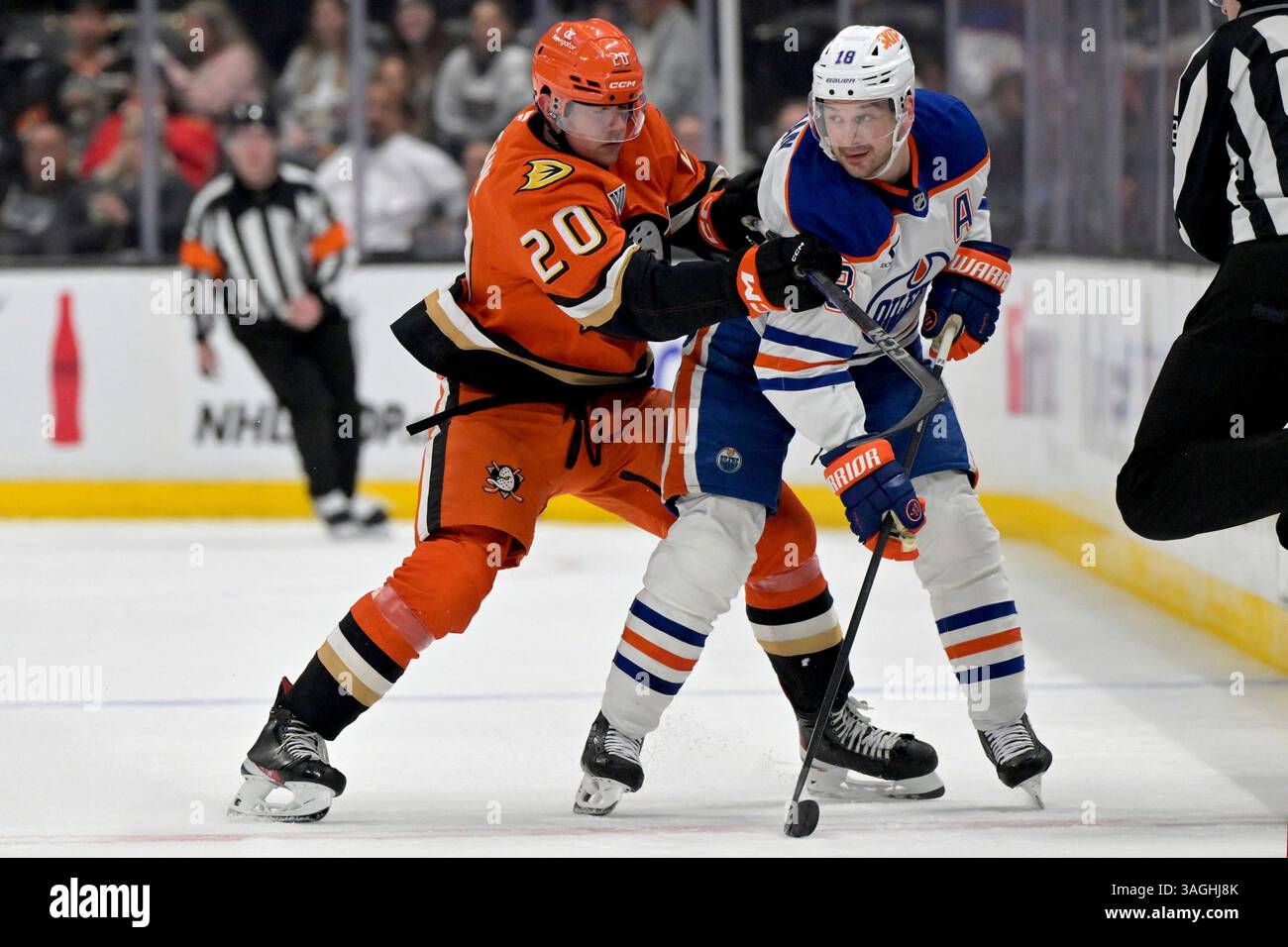 Anaheim Ducks right wing Brett Leason, left, and Edmonton Oilers left ...
