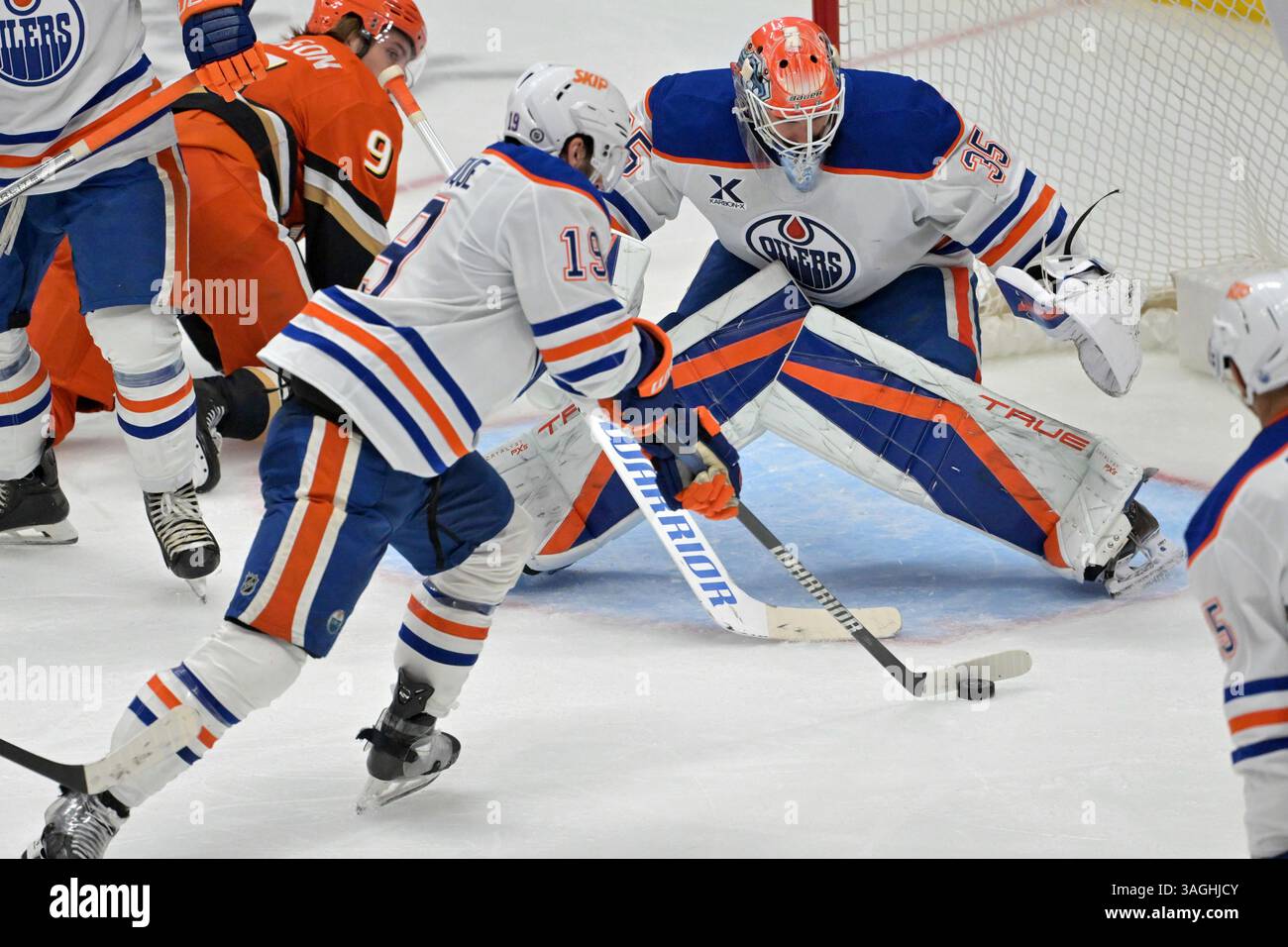 Edmonton Oilers goaltender Oliver Rodrigue defends the net as Edmonton ...