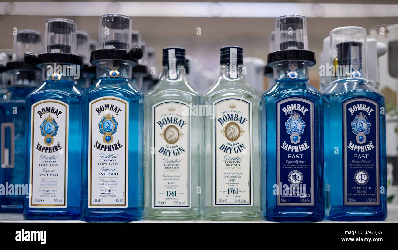 An elegant display of Bombay Sapphire gin bottles, showcasing various ...