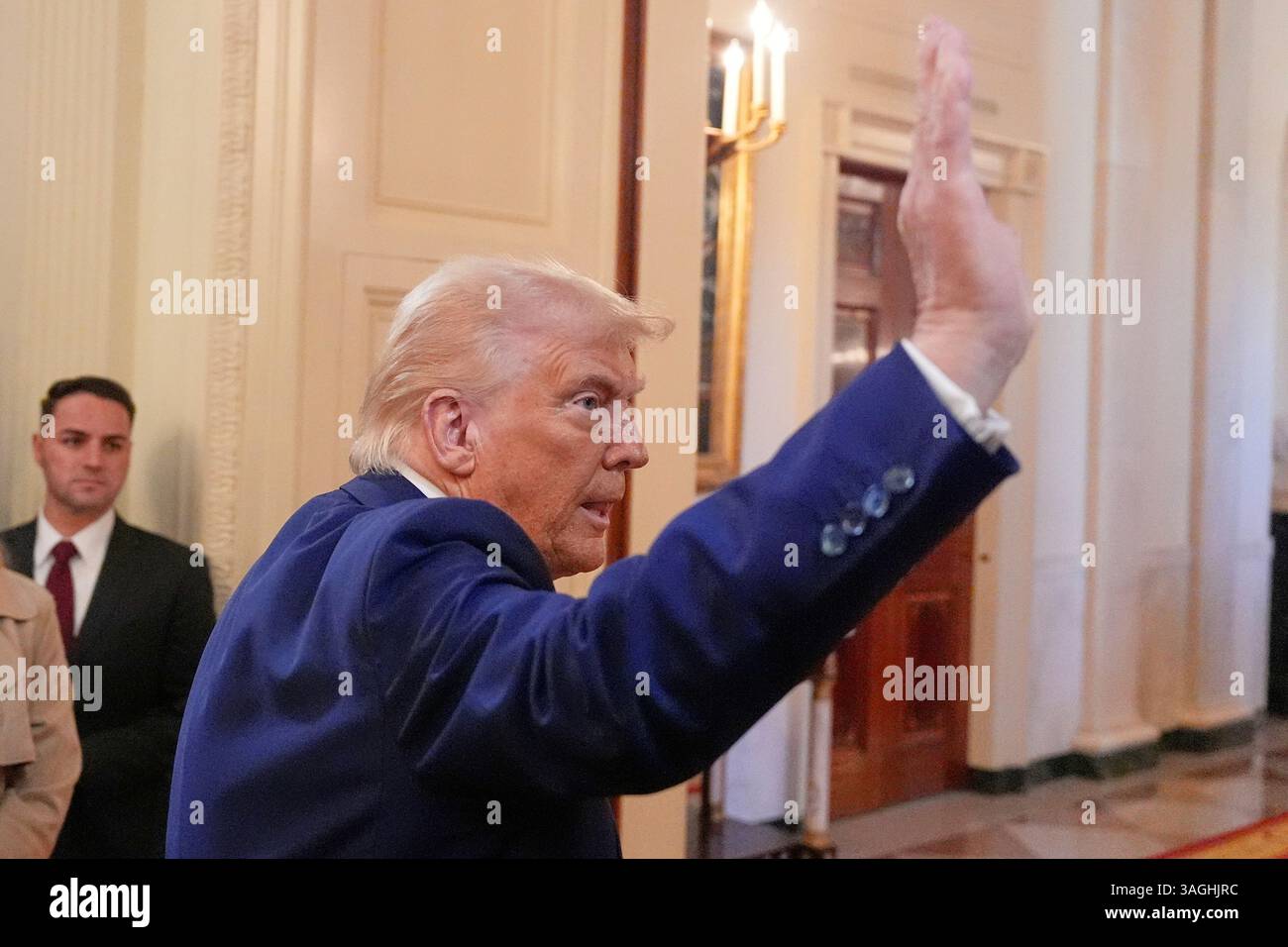 President Donald Trump departs after an event in the East Room of the ...