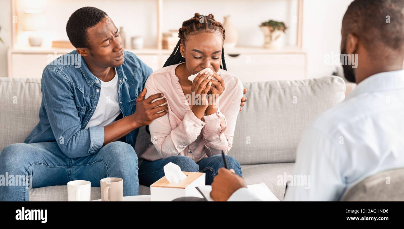Young black woman crying at meeting with family counselor, husband ...