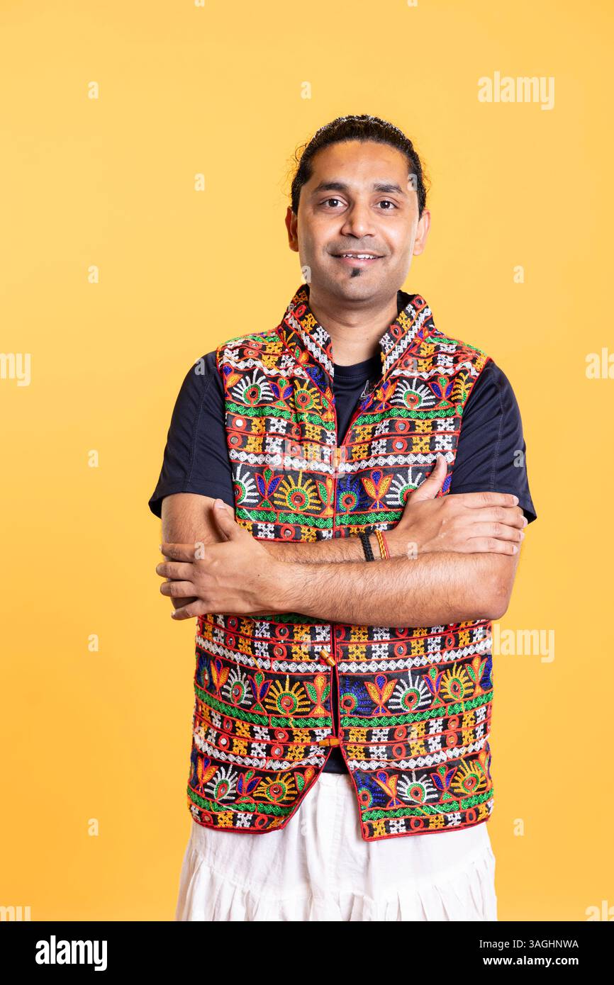 Portrait of radiant calm indian man smiling, looking pleased, isolated ...