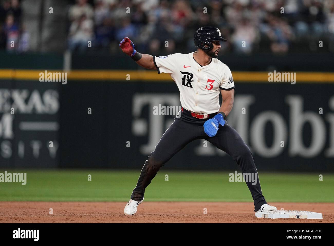 Texas Rangers' Leody Taveras reaches for a double against the Tampa Bay ...