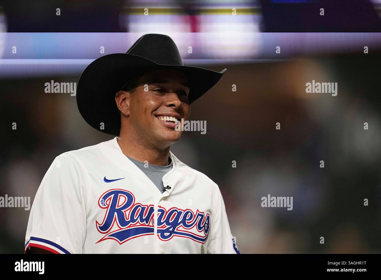 Two-time American Rodeo Champion Shad Mayfield walks off the field ...
