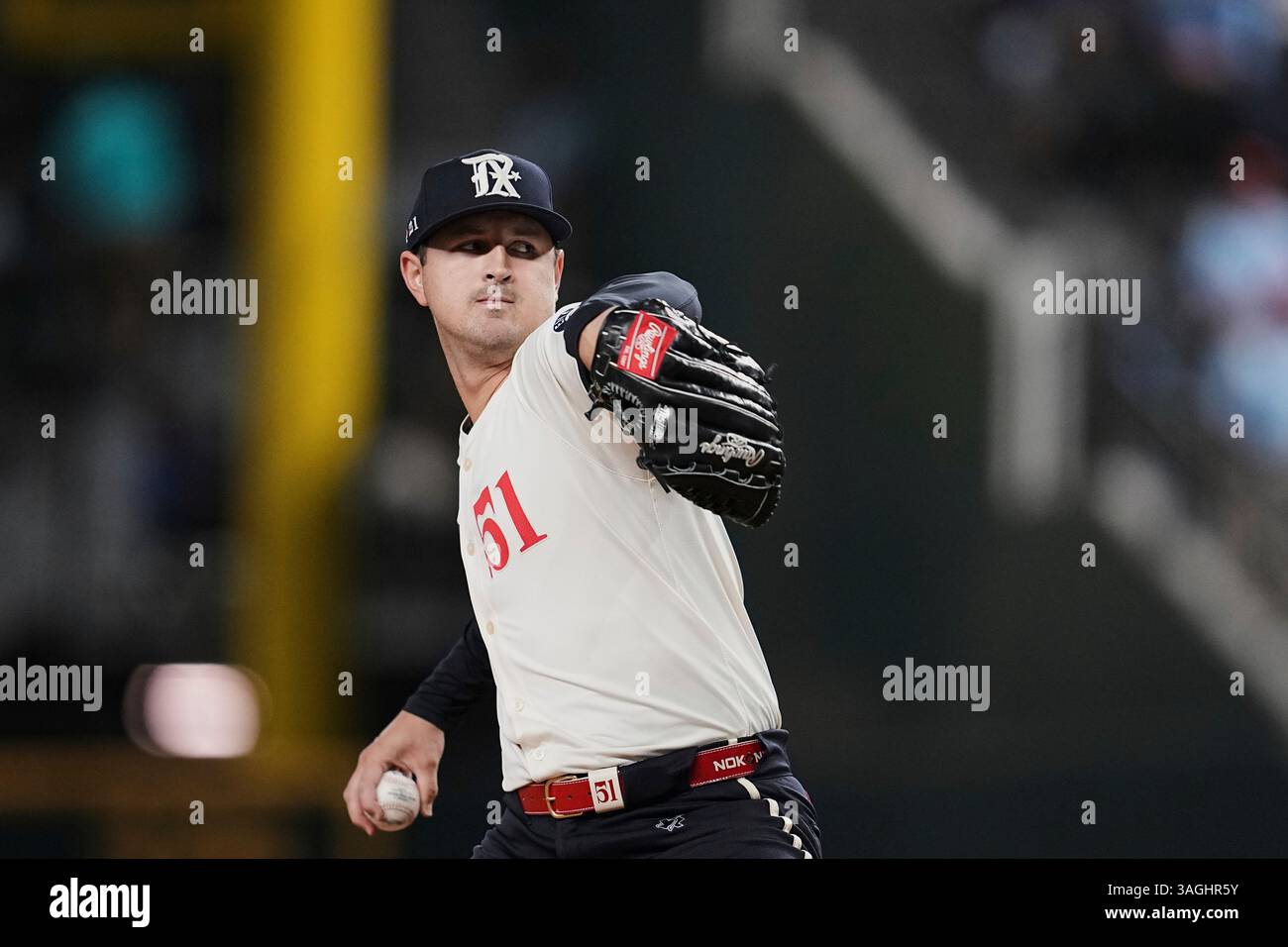 Texas Rangers starting pitcher Tyler Mahle throws to the Tampa Bay Rays ...