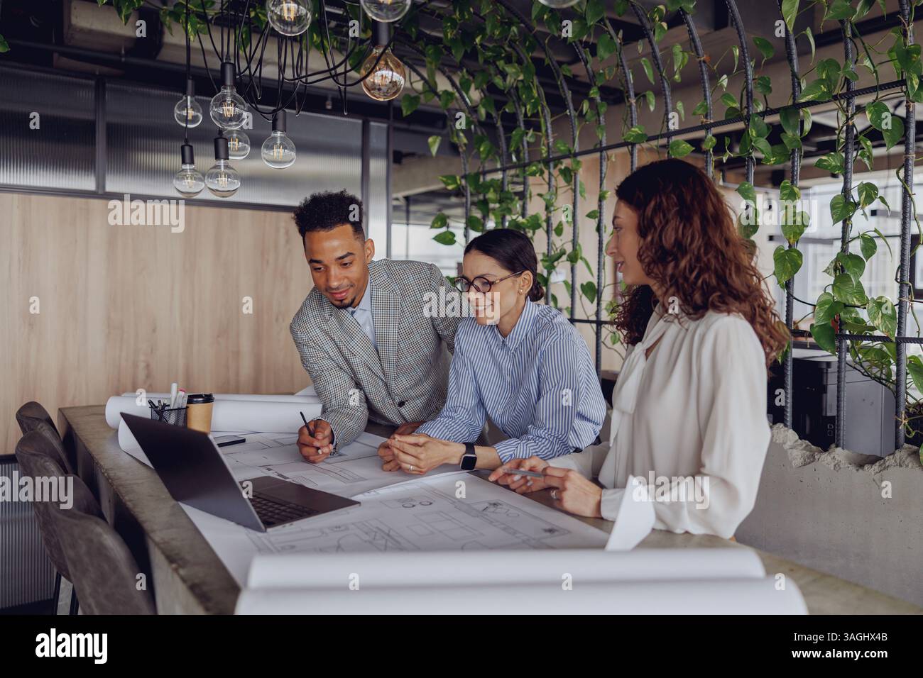 Engaging in a Collaborative Team Meeting within a Modern and Innovative Workspace Setting Stock ...