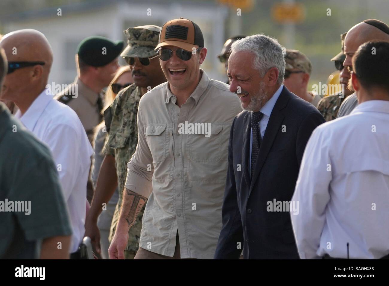 U.S. Defense Secretary Pete Hegseth, center, walks with Panama Canal ...