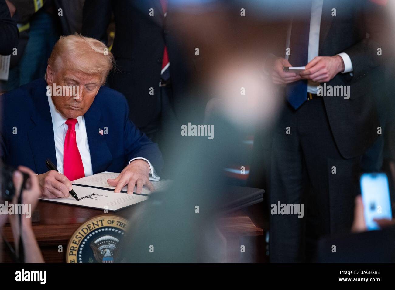 United States President Donald Trump signs executive orders slated to ...