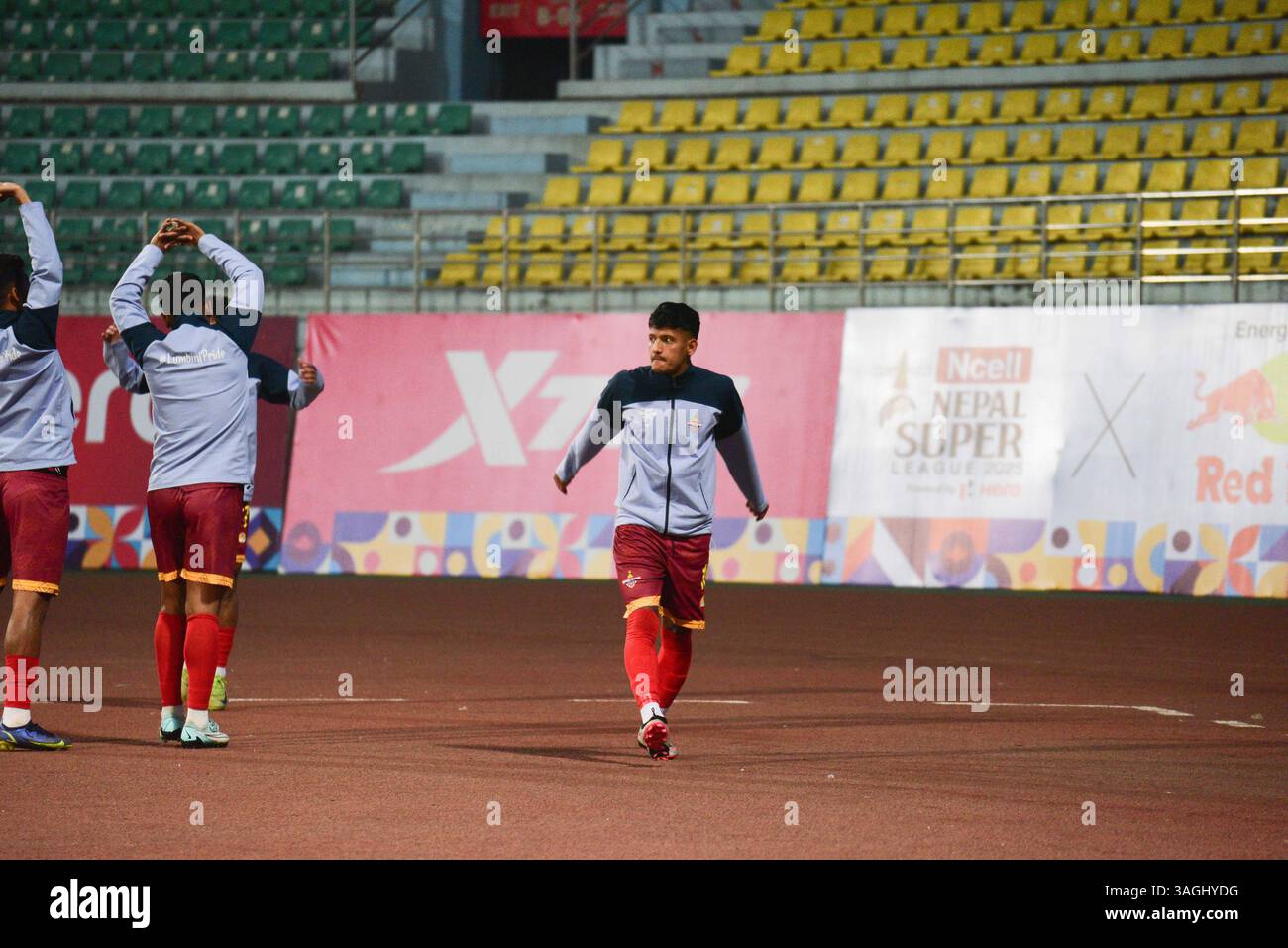 Kathmandu, Bagmati, Nepal. 8th Apr, 2025. NIRAJAN DHAMI of BUTWAL LUMBINI FC (maroon) warms up ...