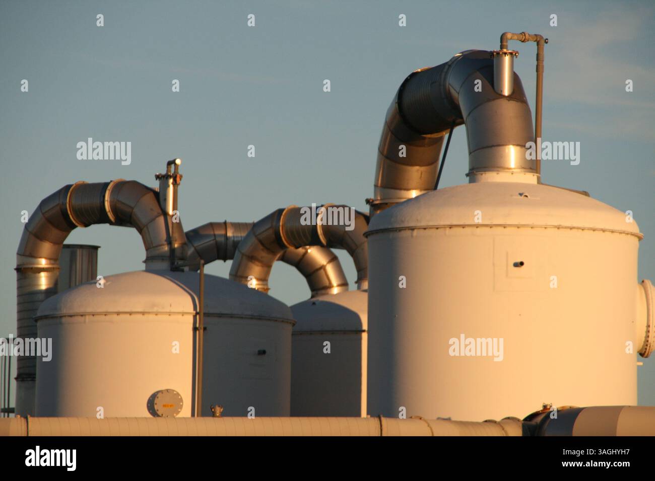 Industrial storage tanks at a paint factory Stock Photo - Alamy