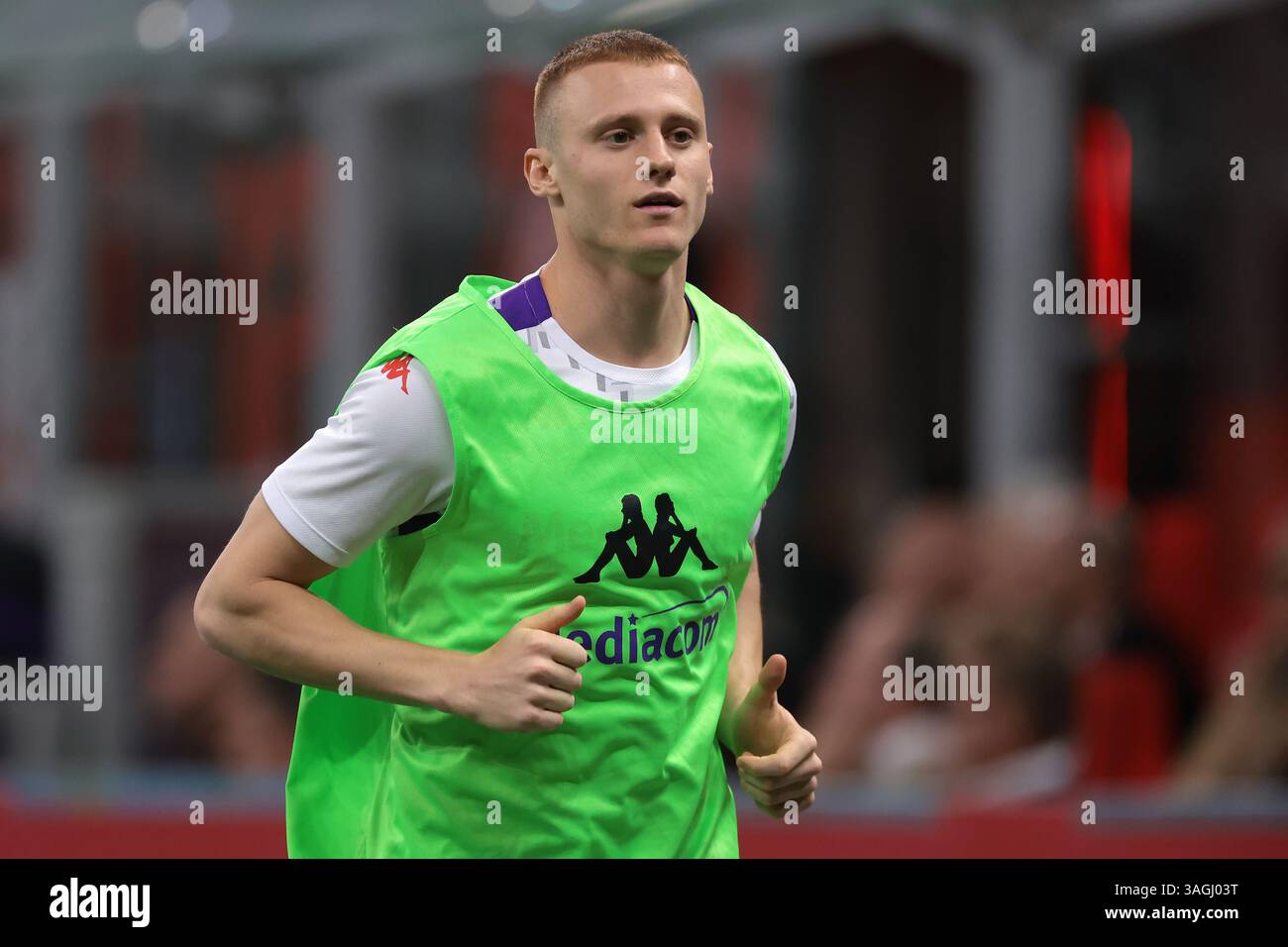 Milan, Italy. 5th Apr, 2025. Pietro Comuzzo of ACF Fiorentina warms up ...