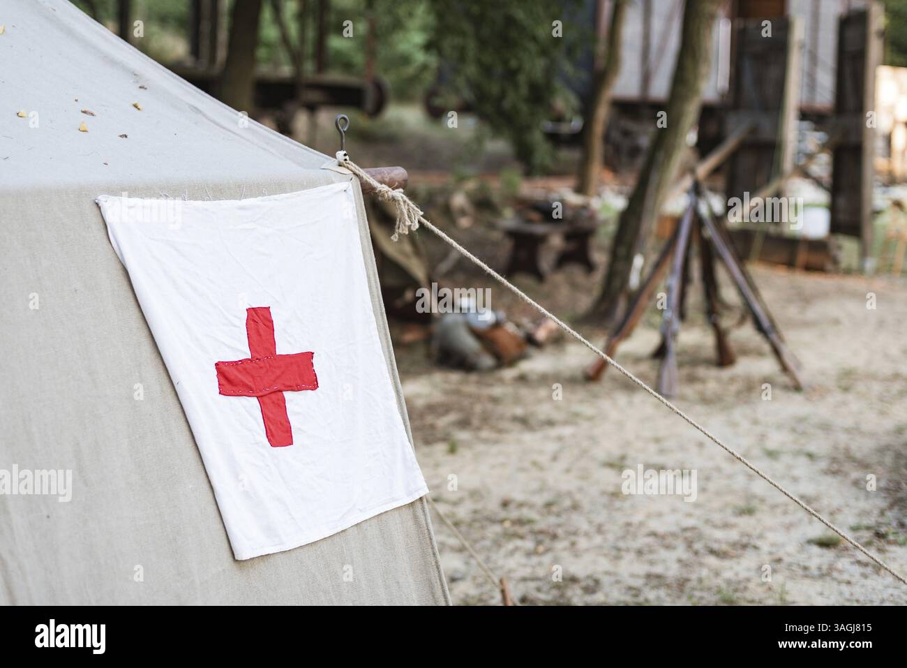 Tent with Red Cross sign during staging of a military camp from World ...