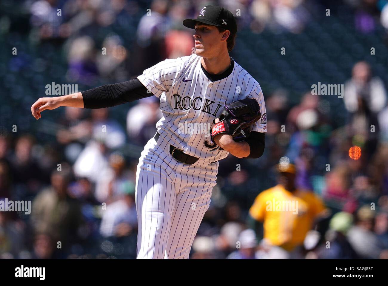 Colorado Rockies starting pitcher Chase Dollander (32) in the first ...