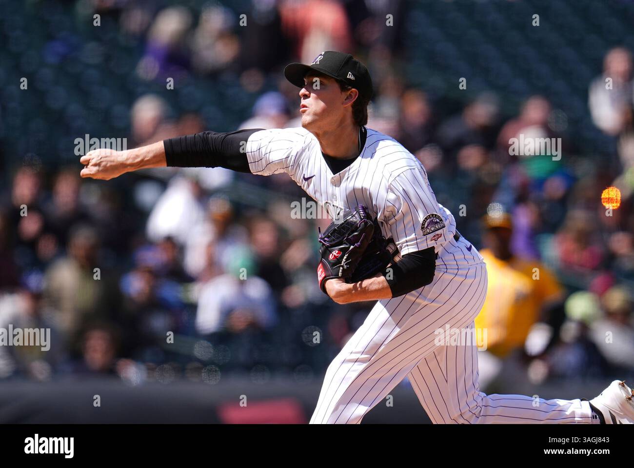 Colorado Rockies starting pitcher Chase Dollander (32) in the first ...