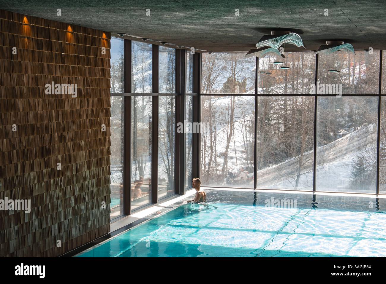 Indoor Pool with Floor to Ceiling Windows in the Italian Alps Stock ...